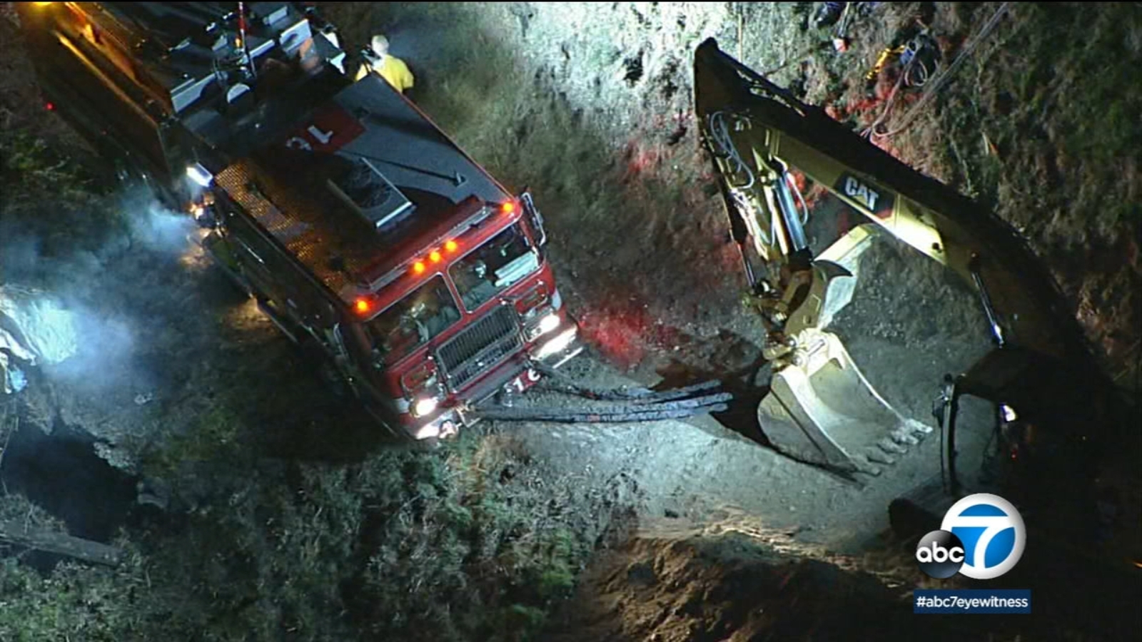 Crews rescue LAFD fire truck that was stuck on muddy, narrow road in ...