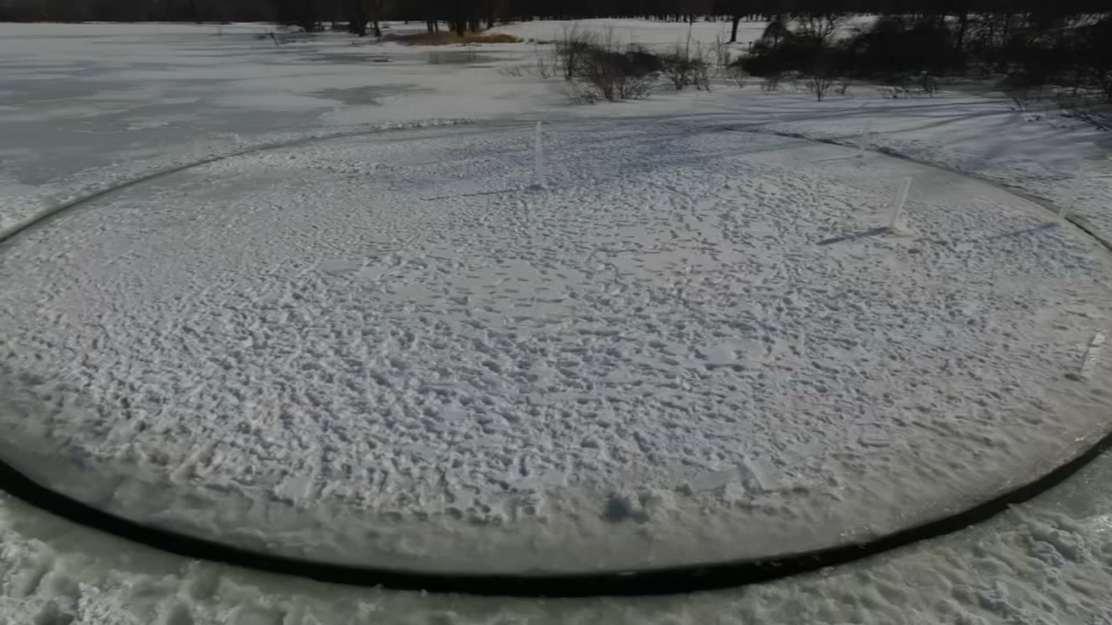 Michigan dads create giant, spinning 'ice carousel' on Spring Lake ...