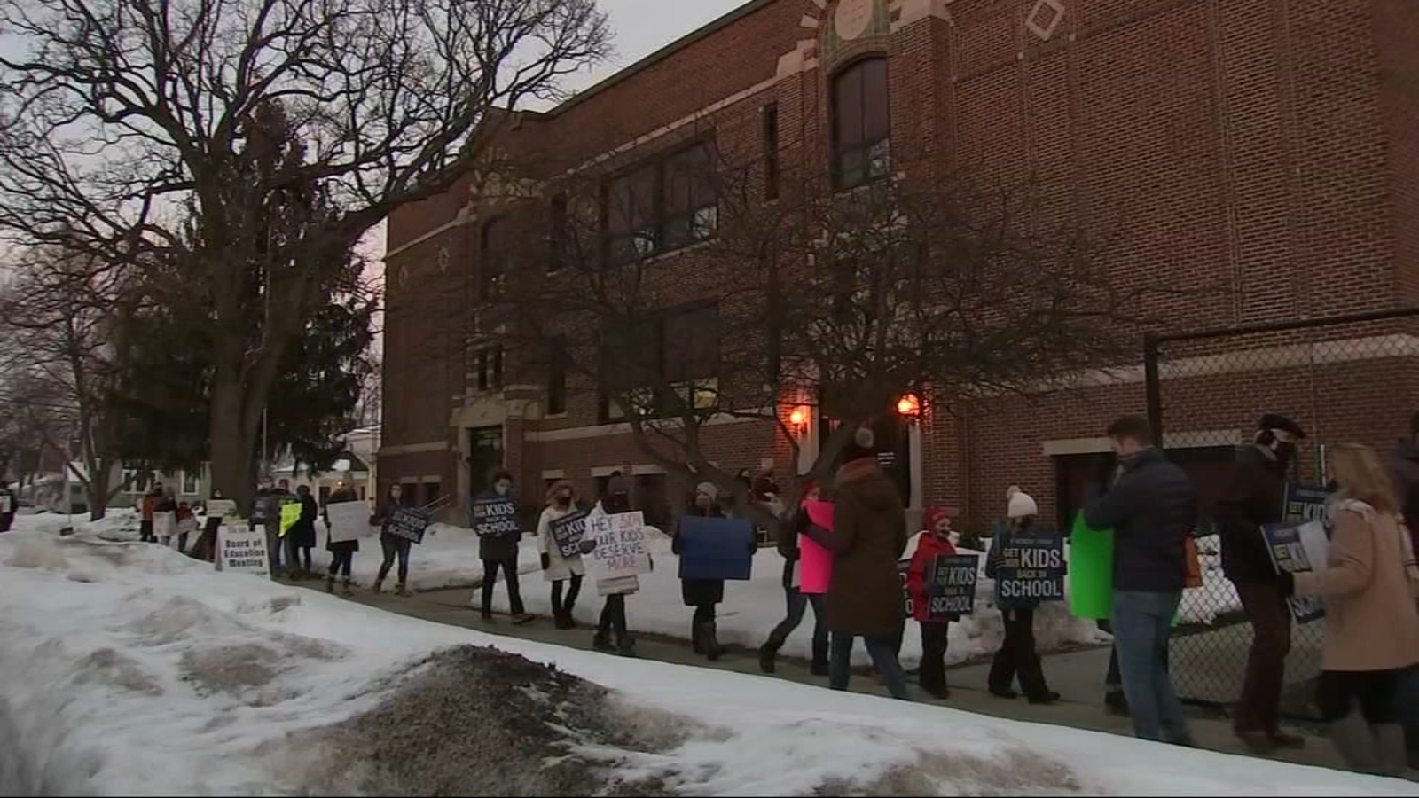 Geneva District 304 parents stage protest ahead of school board meeting ...