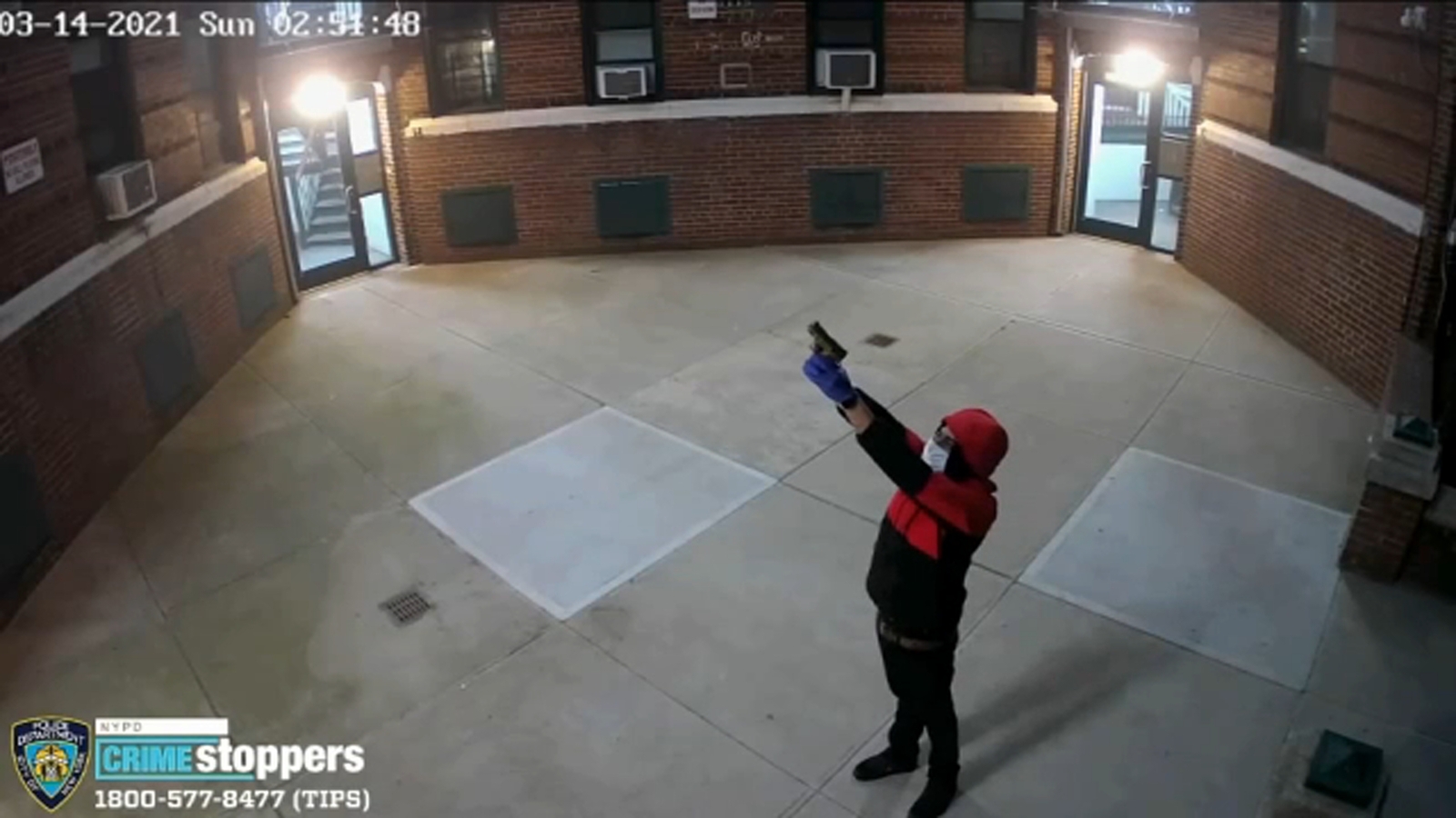 Video shows shots fired into Jackson Heights, Queens apartment building ...