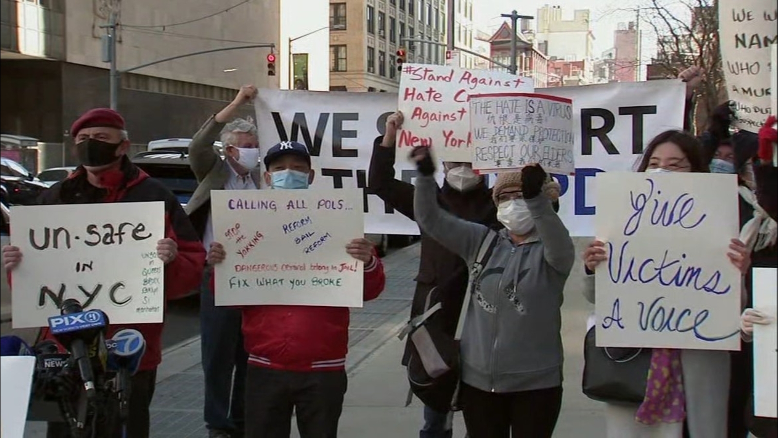 Anti-hate crime rally held before court appearance in Manhattan Asian ...