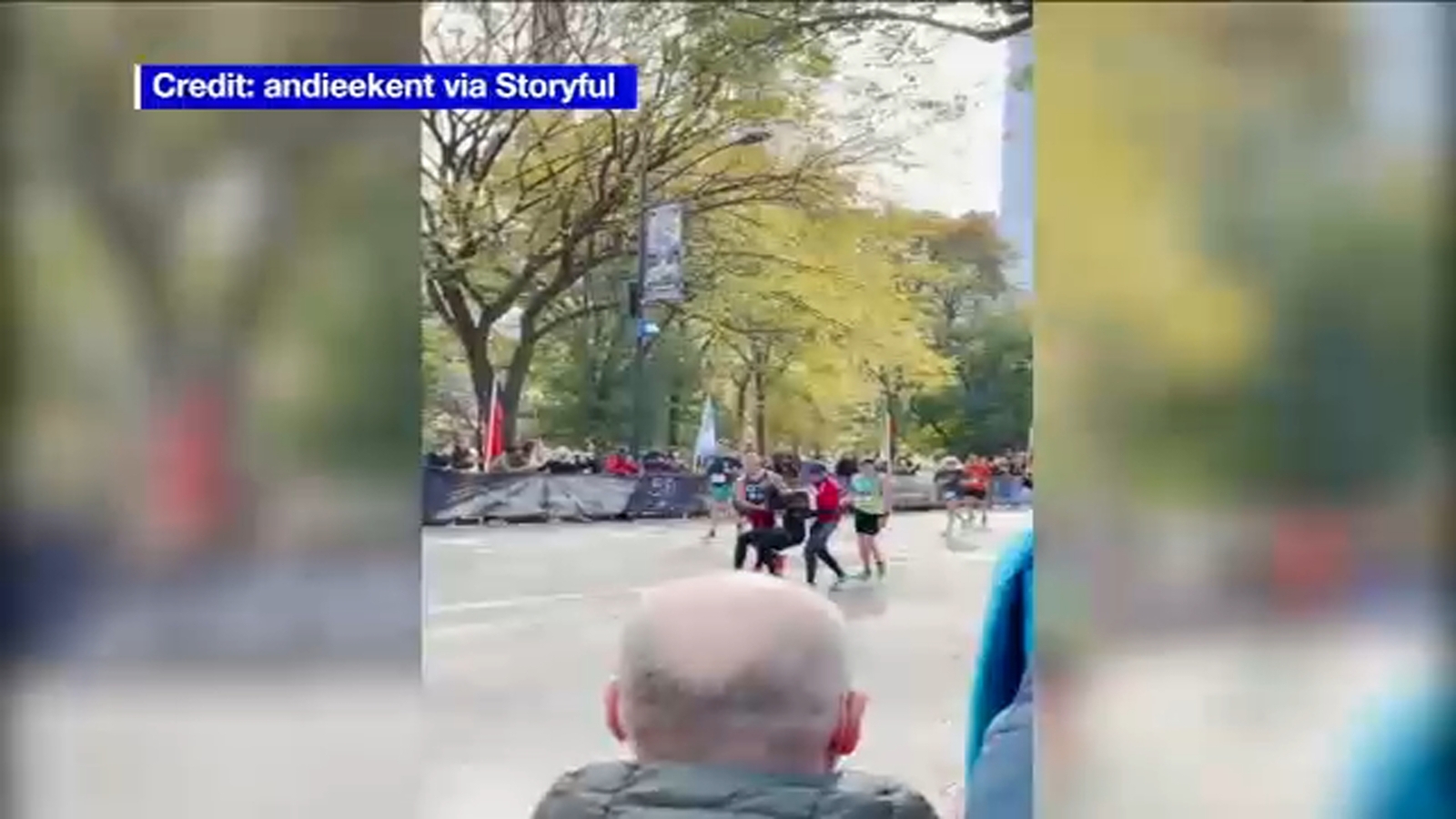 Man falls 650 feet from TCS NYC Marathon finish line, carried across by ...