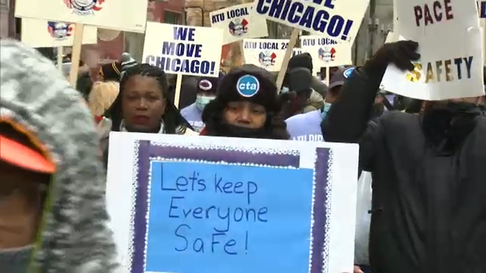 CTA bus drivers, train operators march down Michigan Ave. calling for ...