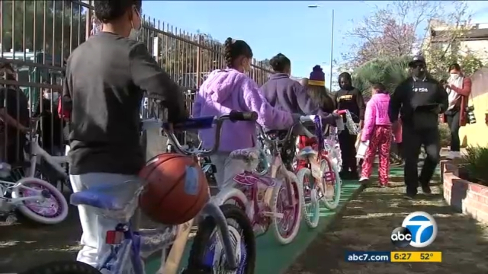 Watts students receive bikes and toys at annual Christmas Party hosted ...