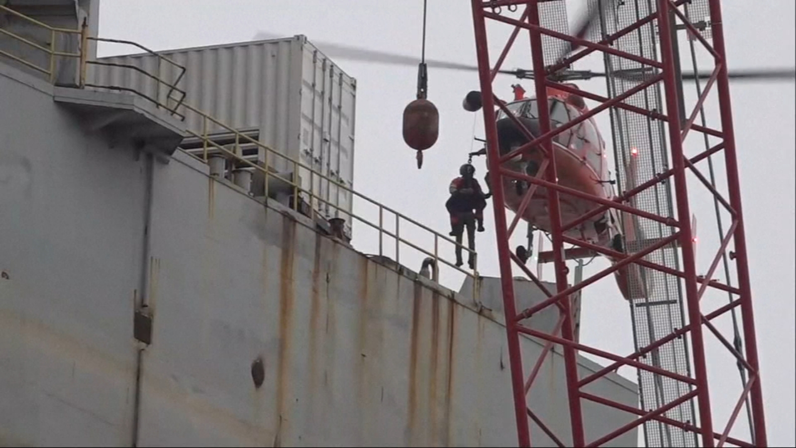 U.S. Coast Guard performs aerial rescue of 9 workers from burning oil ...