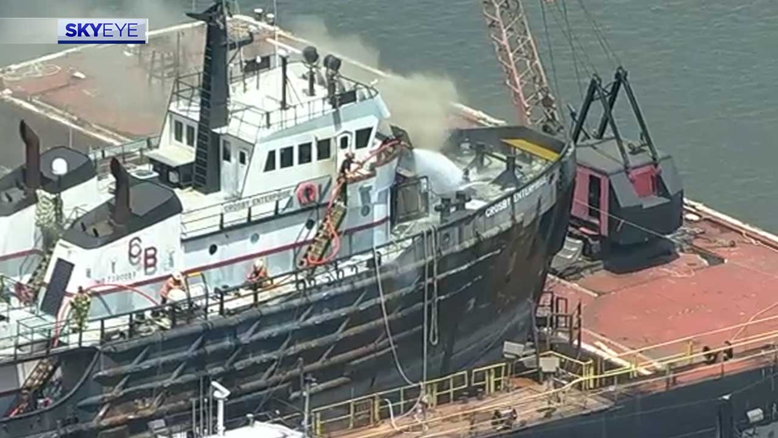 Houston firefighters battle fire aboard ship on dry dock in the Houston ...