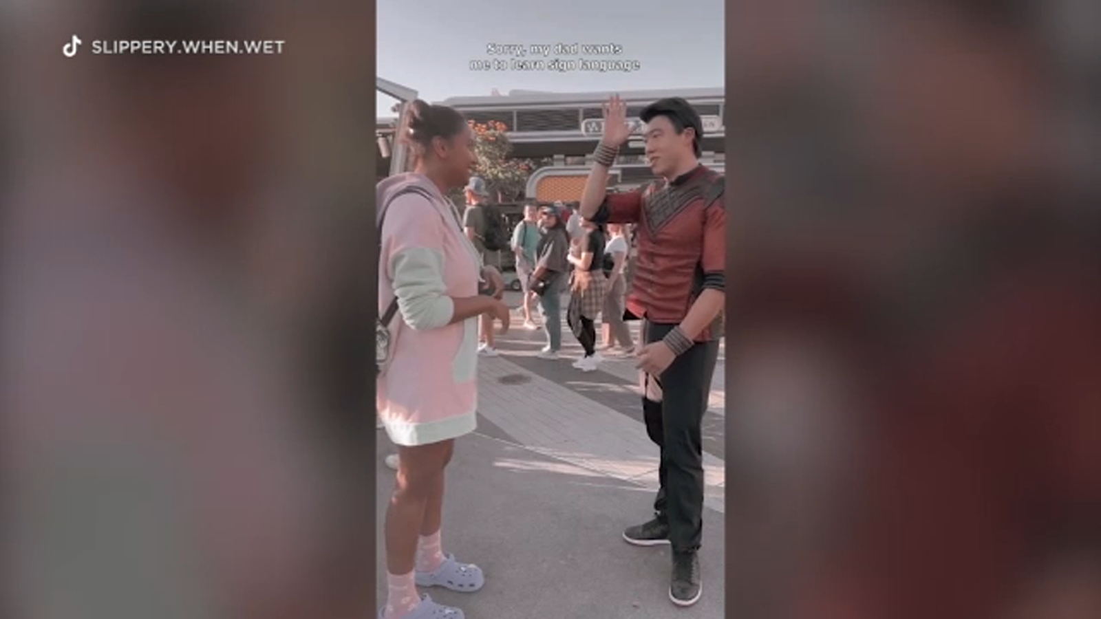 Shang Chi Character Engages With Guest Using American Sign Language At