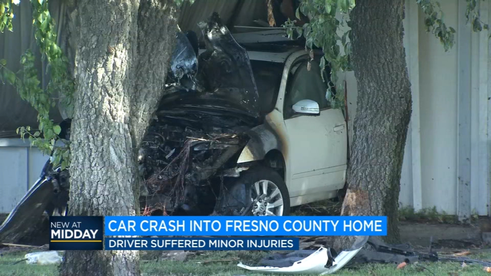 Car fire put out after vehicle crashes into home near Selma - ABC30 Fresno