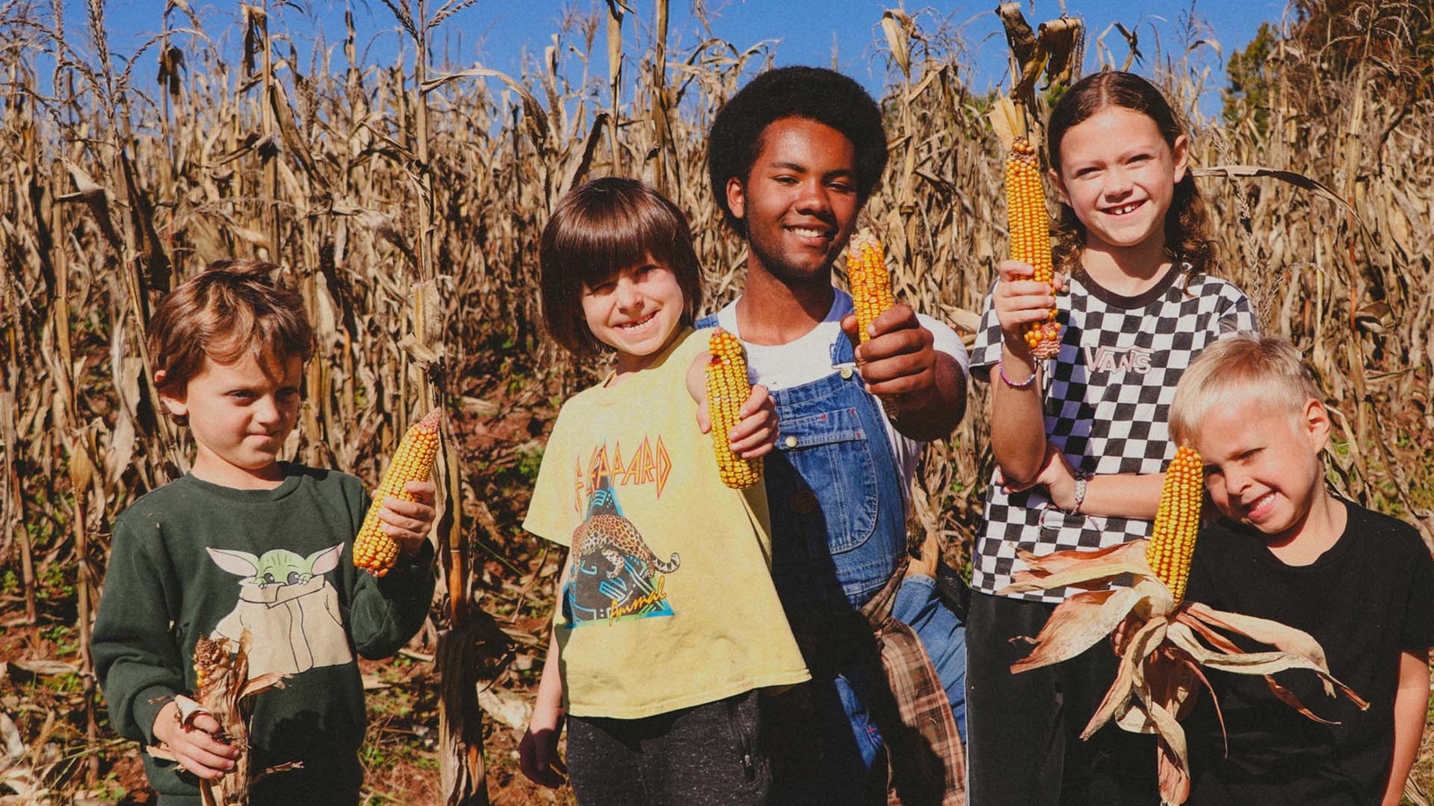 Families hand-pick corn for a good cause at New Jersey living history ...