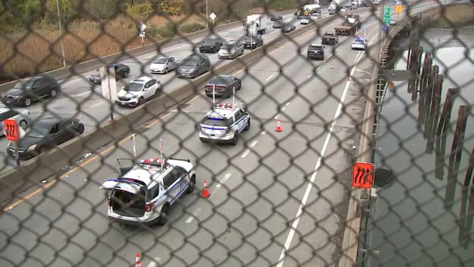 Worker killed after falling from overpass, getting hit by vehicle on ...