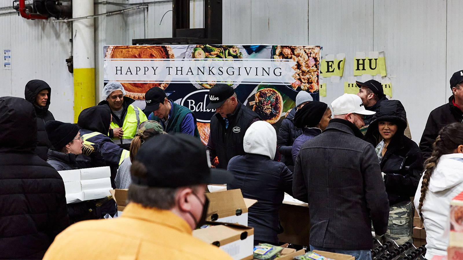 Volunteers distribute free Thanksgiving food boxes in the Bronx to ...