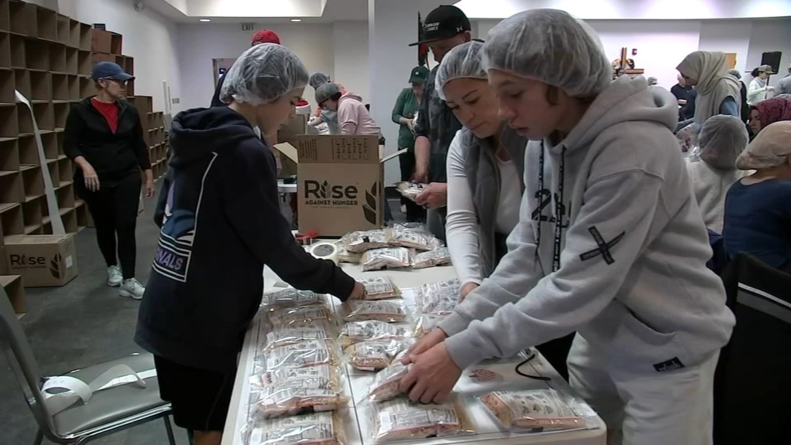 Volunteer| 'It's a good thing': Rise Against Hunger prepares 80,000 ...