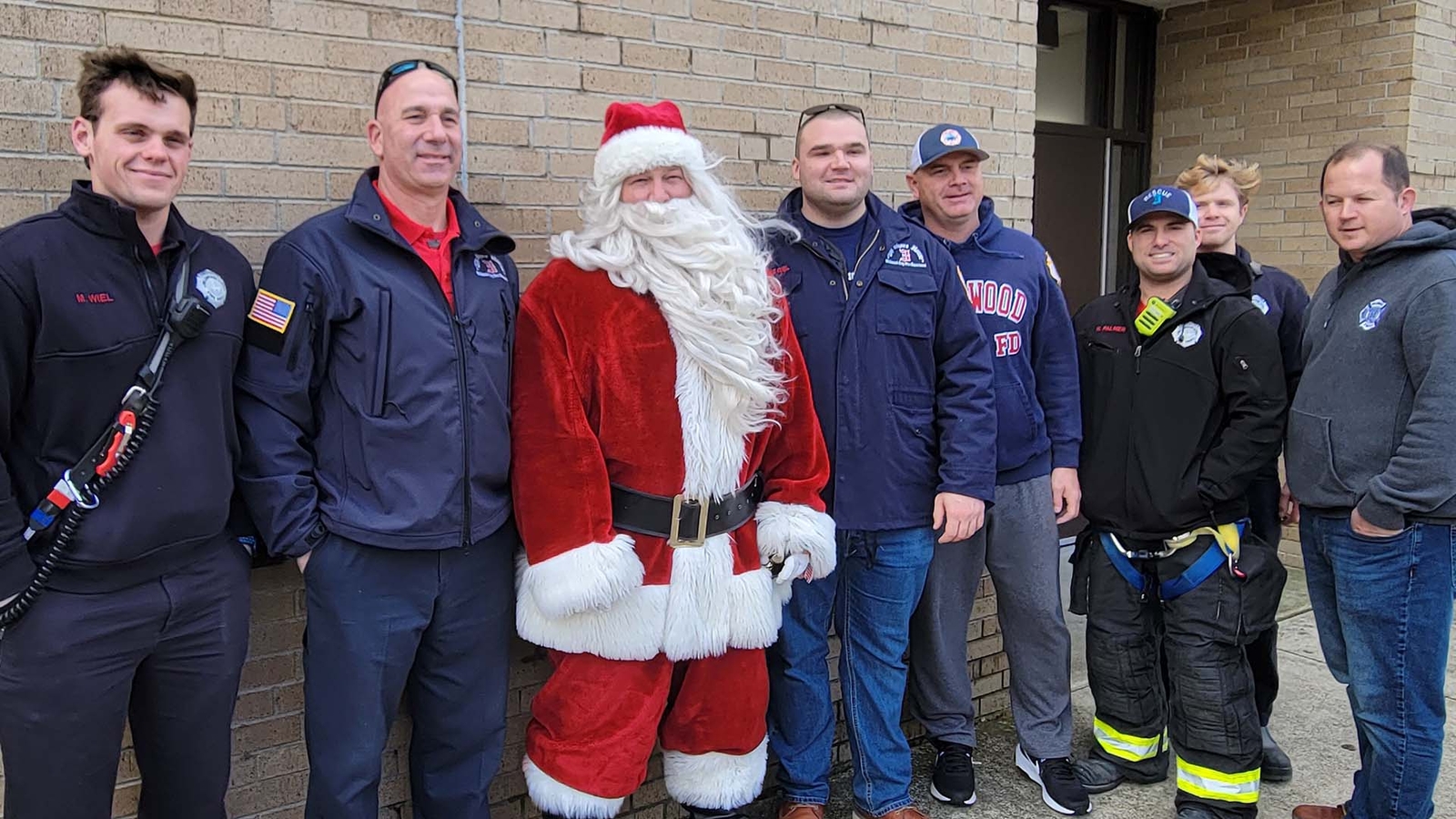 A Christmas tradition: Wildwood firefighters help Santa deliver ...