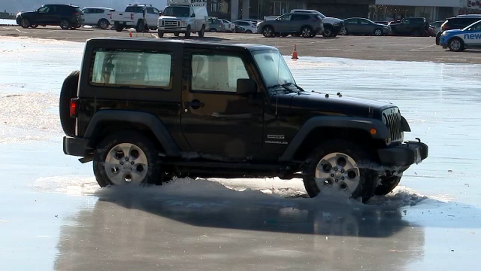 Winter storm 2022: Cars, trucks trapped in iced-over Edgewater, New ...