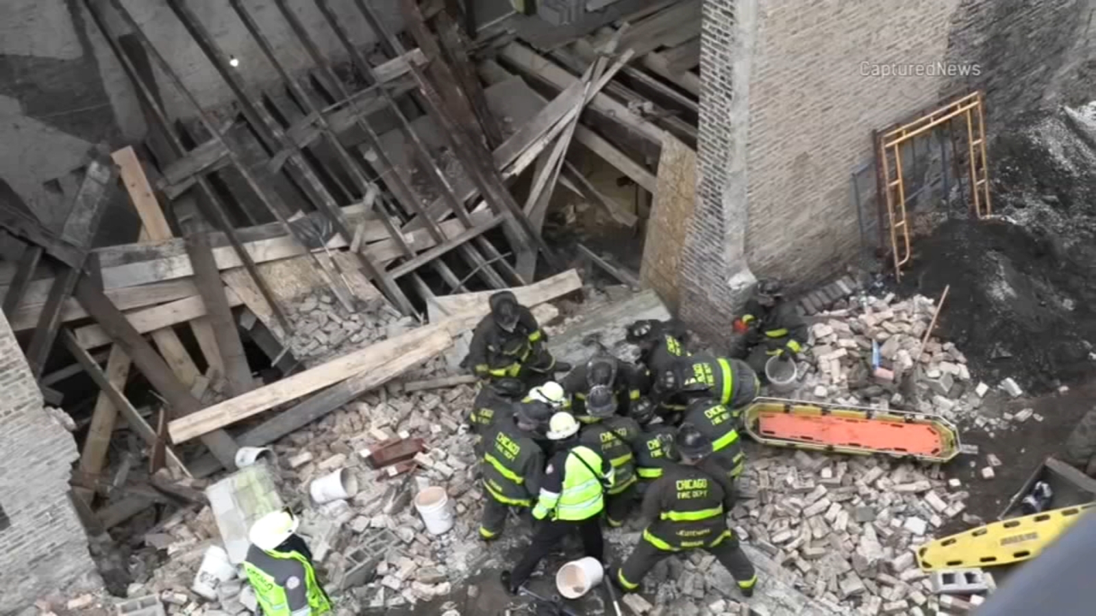 Chicago Fire Department: Worker trapped under debris in Bronzeville ...