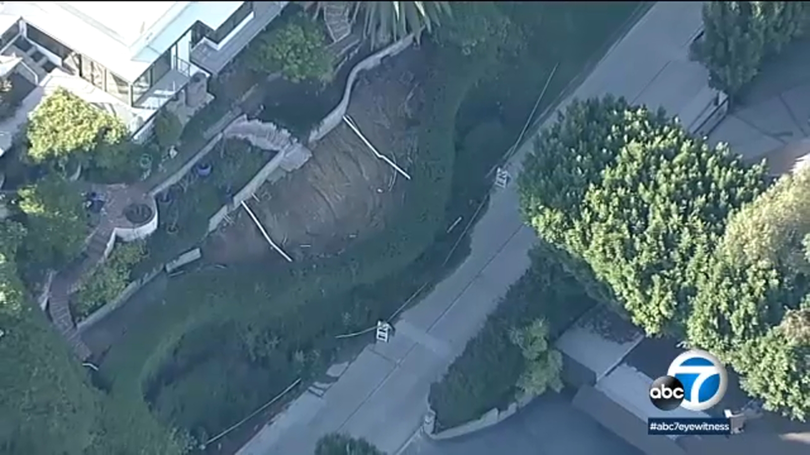 Hillside collapses in front of Johnny Mathis' home in the Hollywood ...