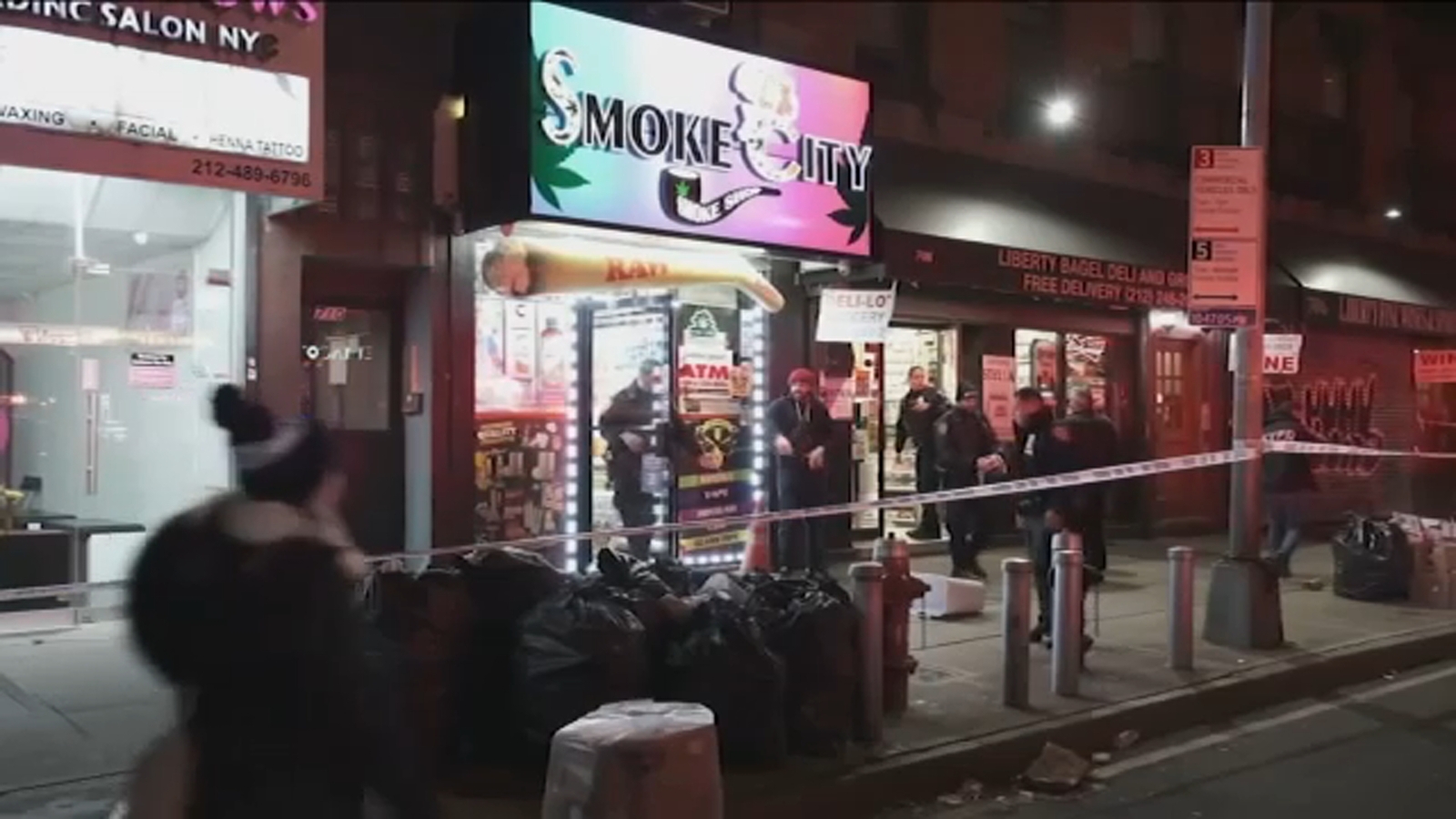Smoke shop worker in Hell's Kitchen shot when at least 5 men attempted ...