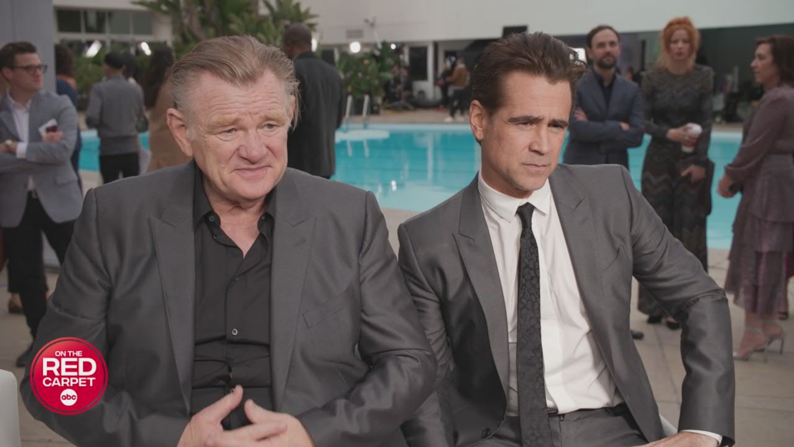 Colin Farrell gets distracted by candy bar during Oscar Luncheon ...