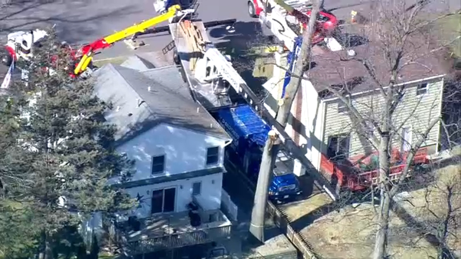 Large construction crane collapsed, tangled in power wires in Cresskill ...