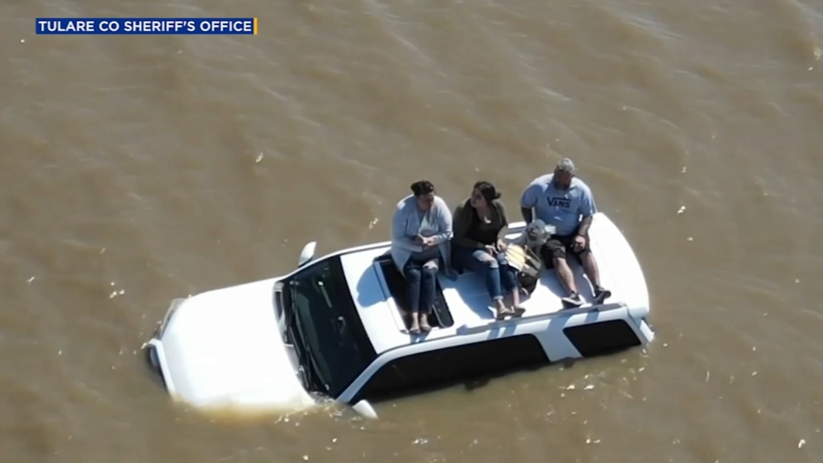 Rescue underway after vehicle gets stuck in flood water in Tulare ...