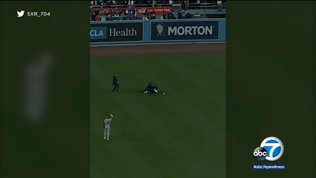 Dodger fan tackled: Couple whose marriage proposal at Dodger Stadium ...