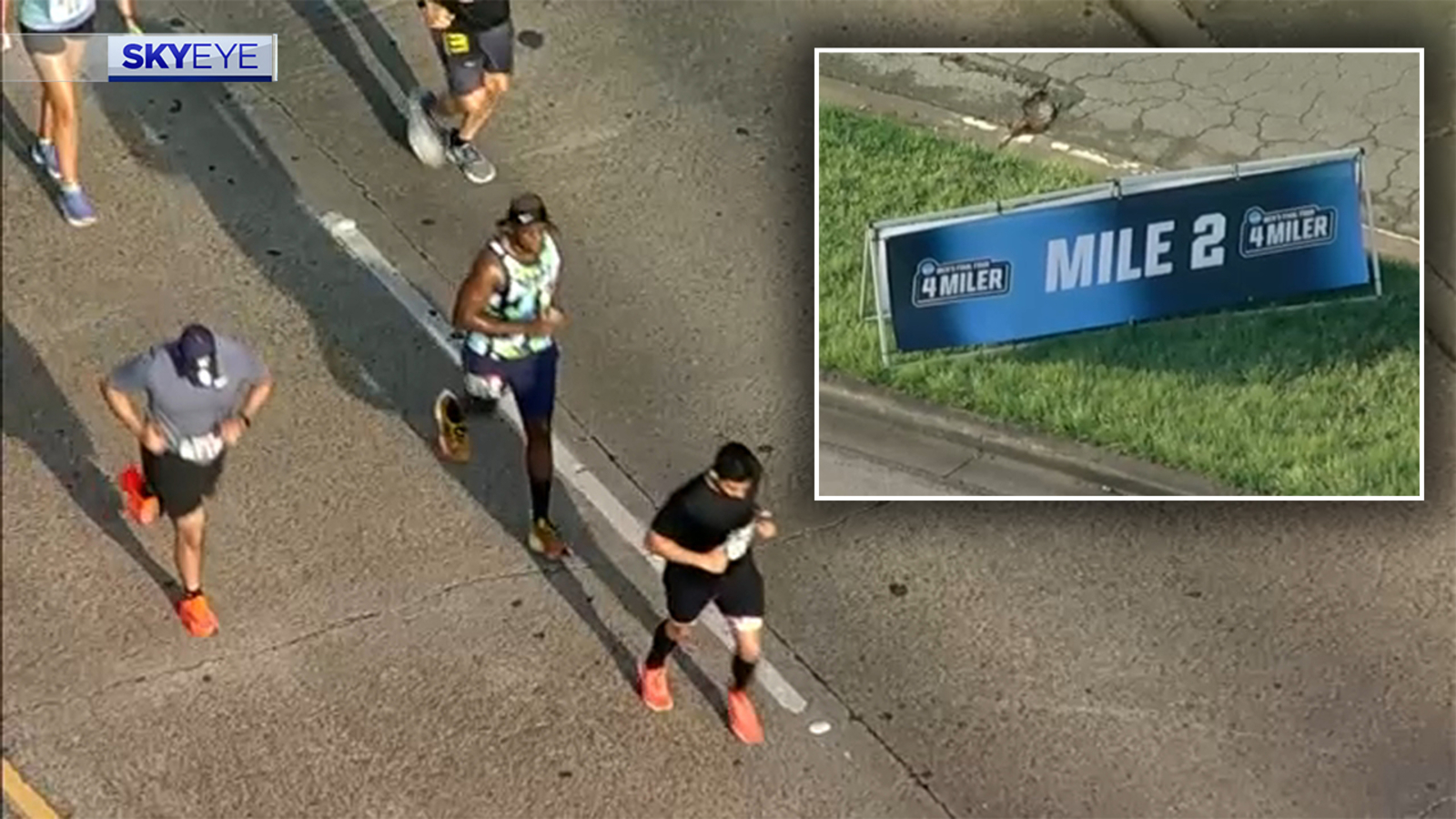 Houston Final Four 4-Miler: Runners celebrate their medals after ...