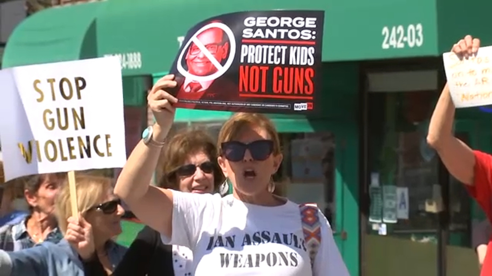 Voters rally outside Rep. George Santos' Queens office for gun safety ...