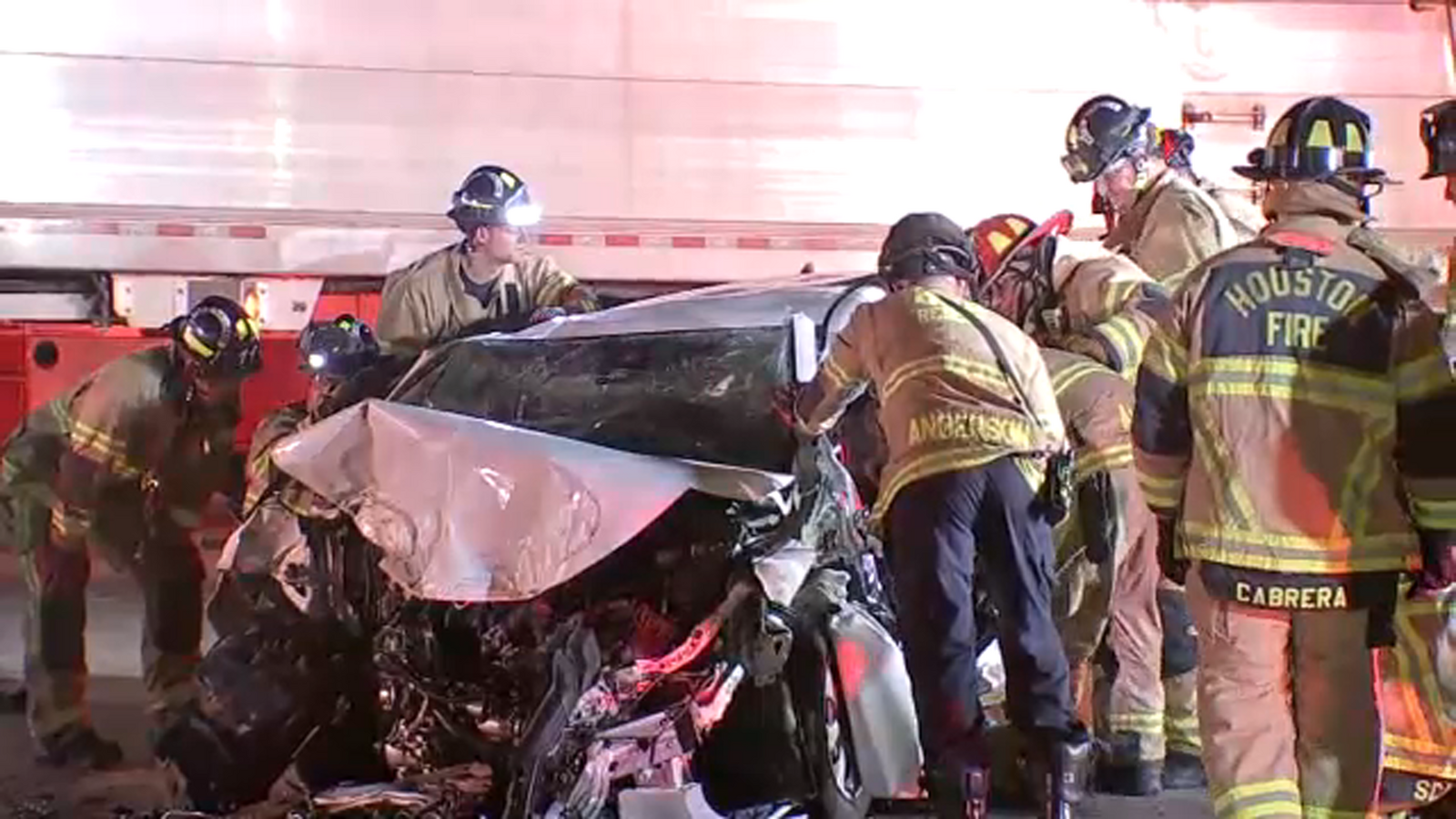 Driver trapped in car rescued after crashing into 18-wheeler that was ...