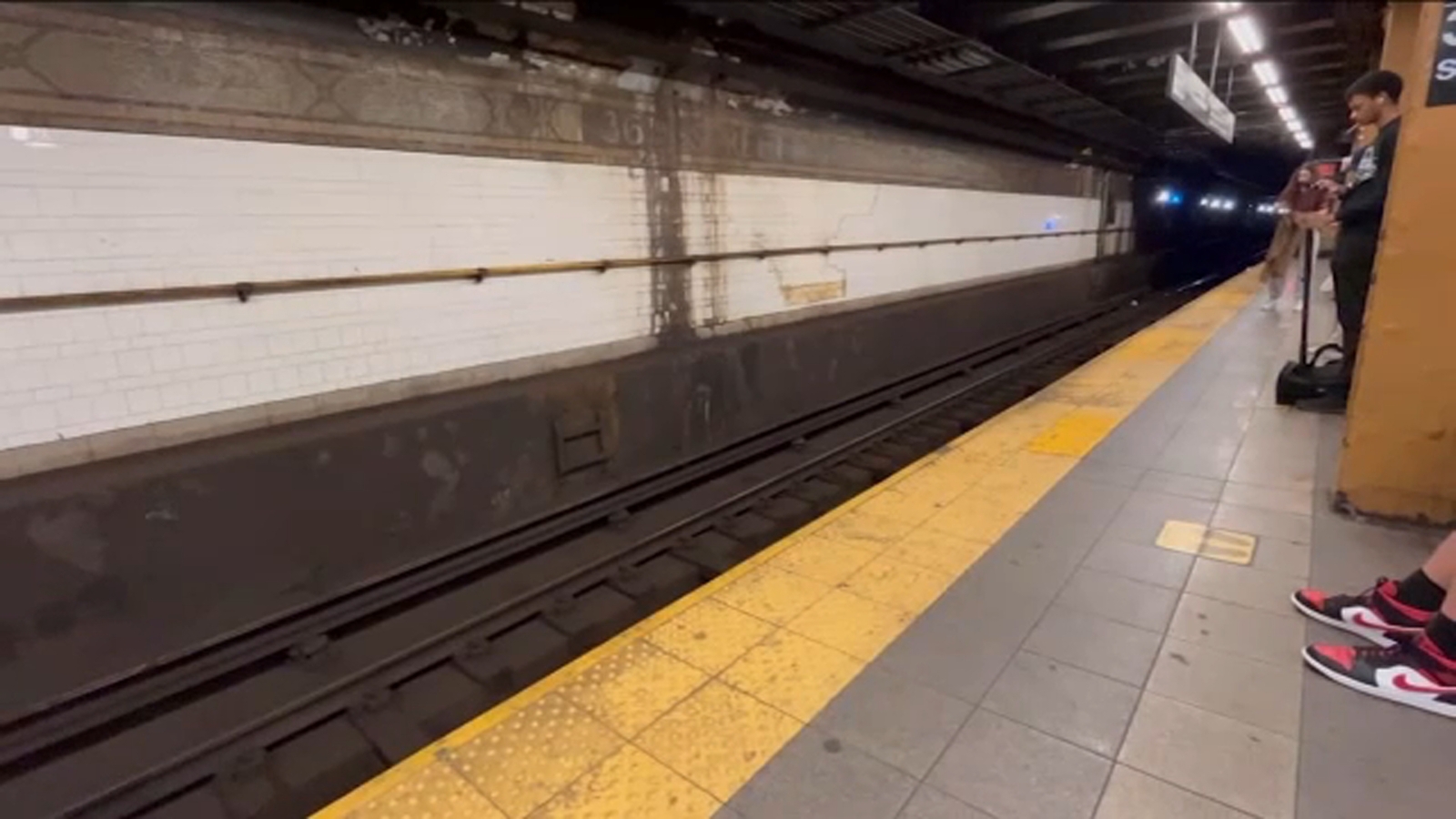 Arrest made after man pushed onto subway tracks in Sunset Park, Brooklyn - ABC7 New York