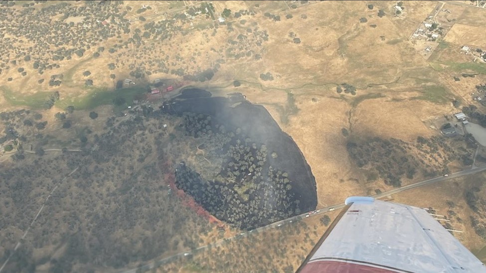 Firefighters stop wildfire from spreading in Yokuts Valley - ABC30 Fresno
