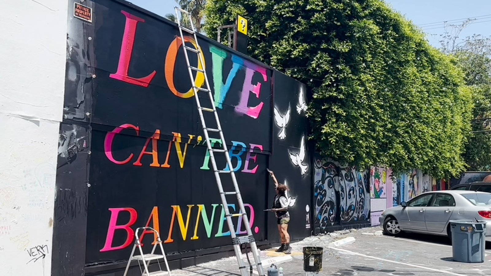 Street artist and activist Corie Mattie unveils 'Love Can't Be Banned ...