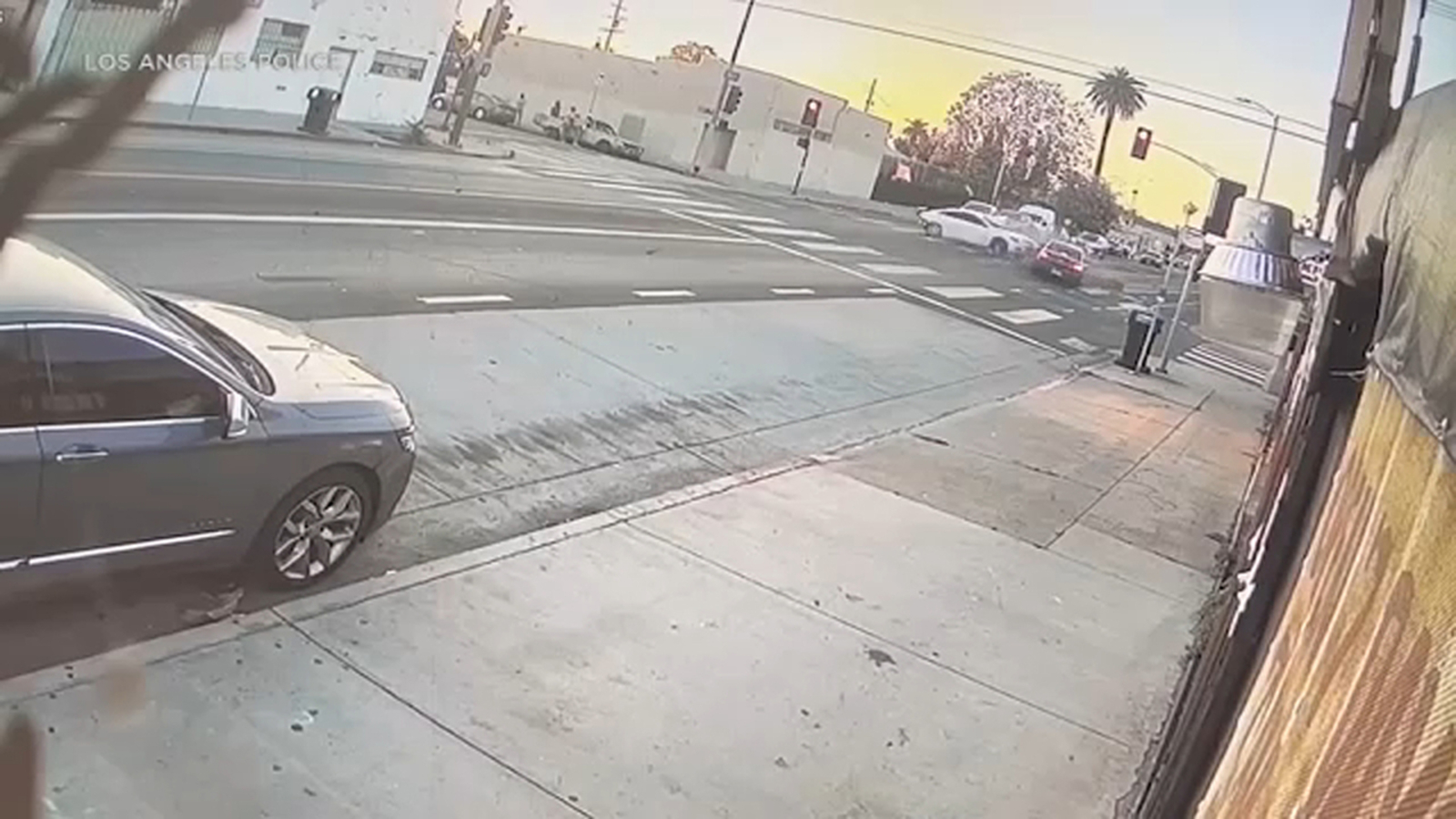 South Los Angeles hit-and-run caught on video: Car runs red light and ...