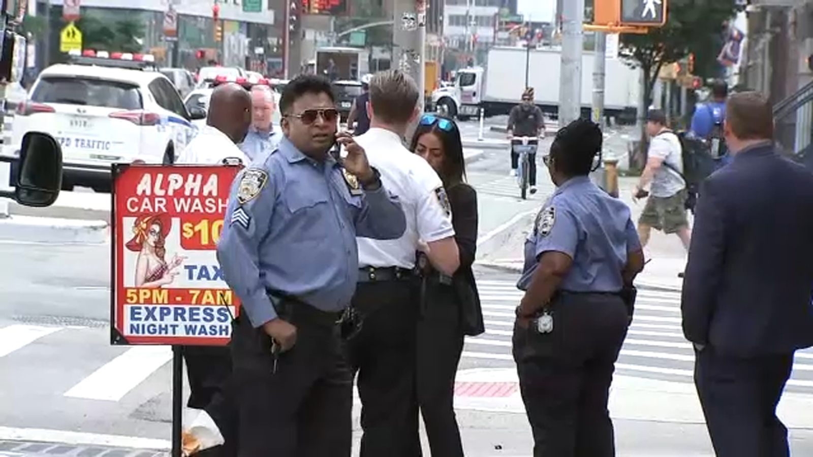 NYC crime: NYPD traffic agent punched multiple times by bicyclist on ...