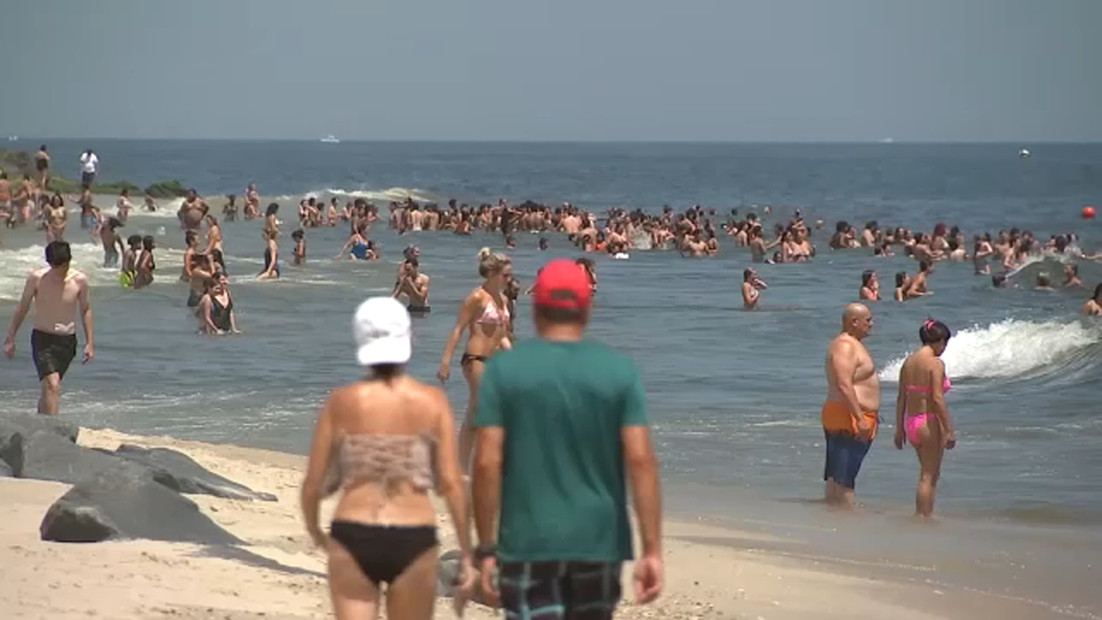 Beachgoers flock to the shore to beat the extreme heat in New York, New Jersey, Connecticut ...