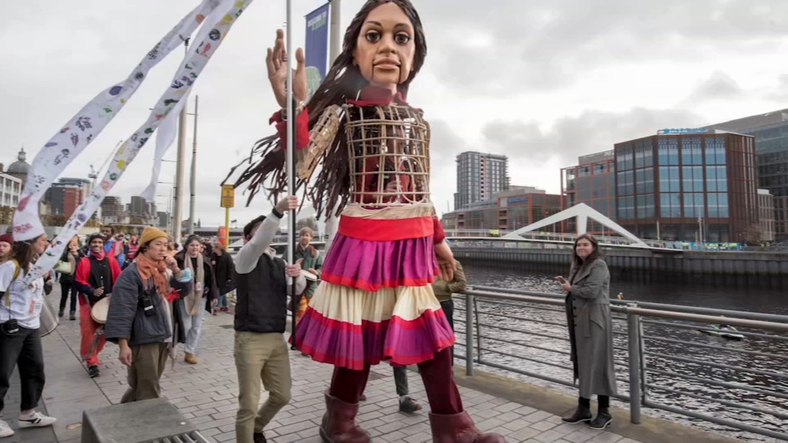 Community groups sew blanket for Little Amal, 12-foot puppet raising ...
