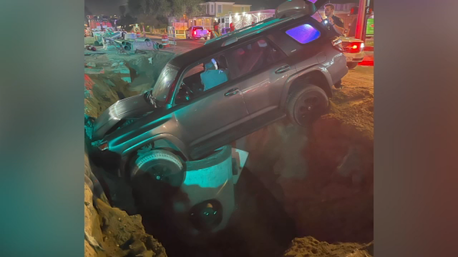 Galveston manhole rescue: Video shows SUV driver stuck in construction ...