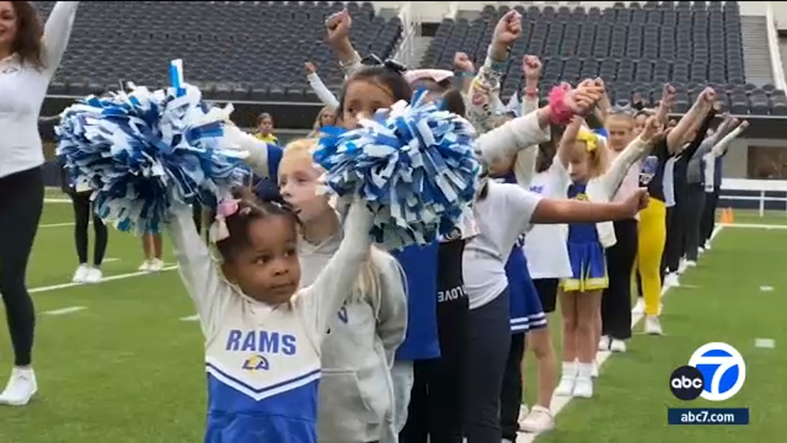 Rams Junior Cheerleaders show off moves during halftime performance ...