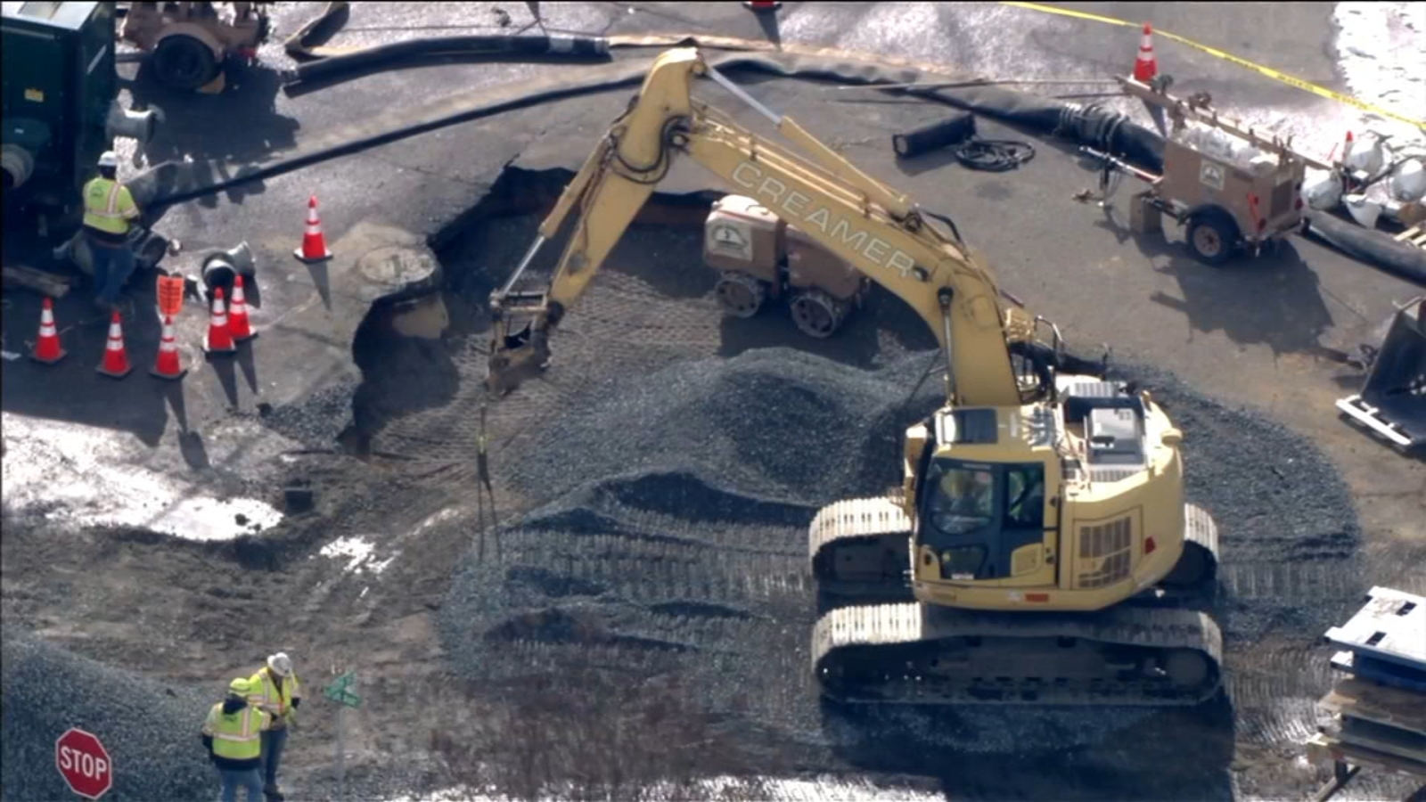 Large sinkhole in Delran, New Jersey, mostly repaired days after sewer ...