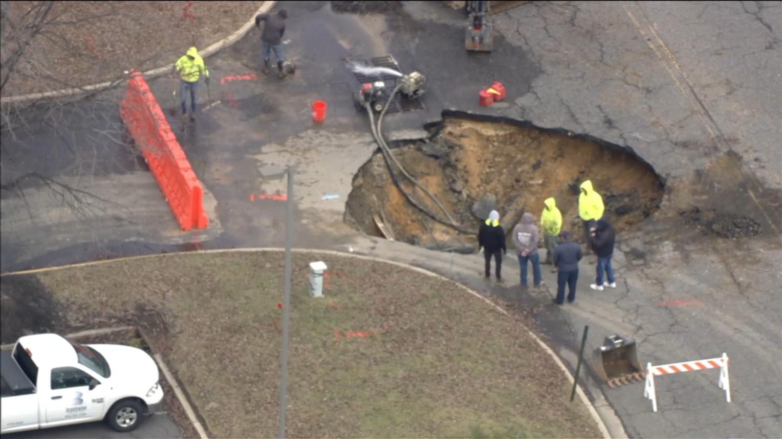 Crews in Mount Laurel, New Jersey working to repair large sinkhole on ...