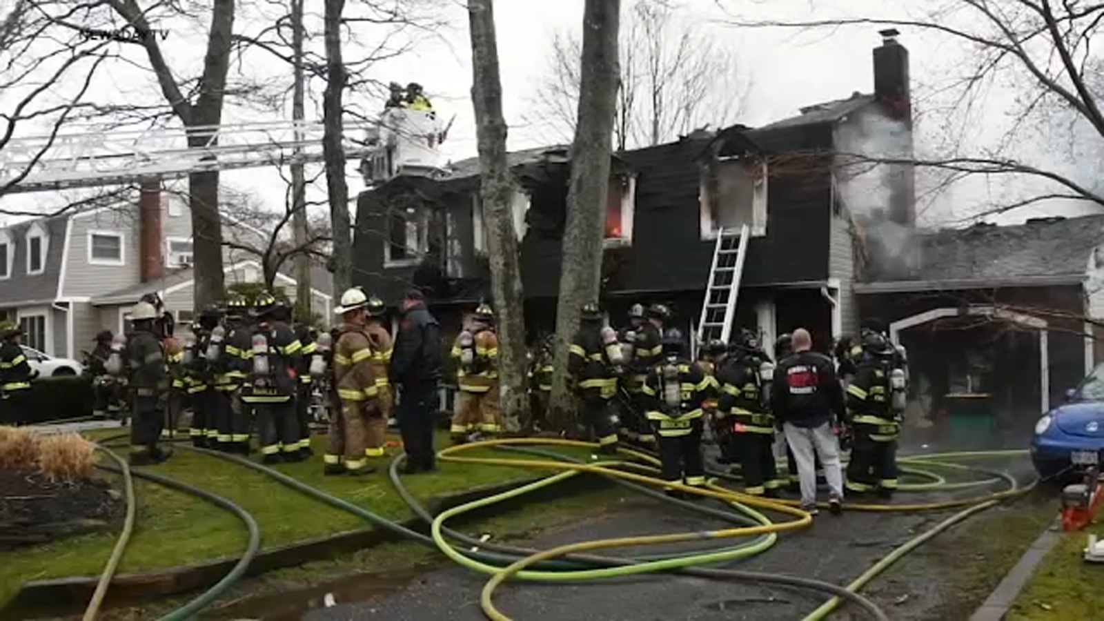 Long Island fire: Neighbor rushes to save teen from burning home in ...
