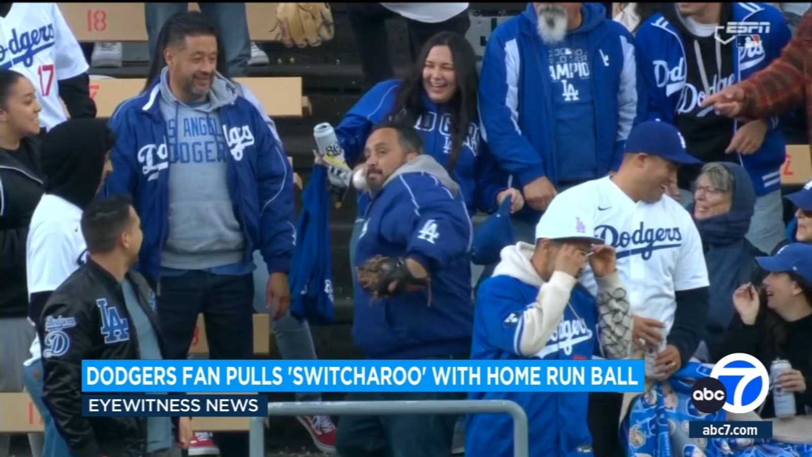 Dodgers fan tries to fake out crowd, pretending to throw back home run ...