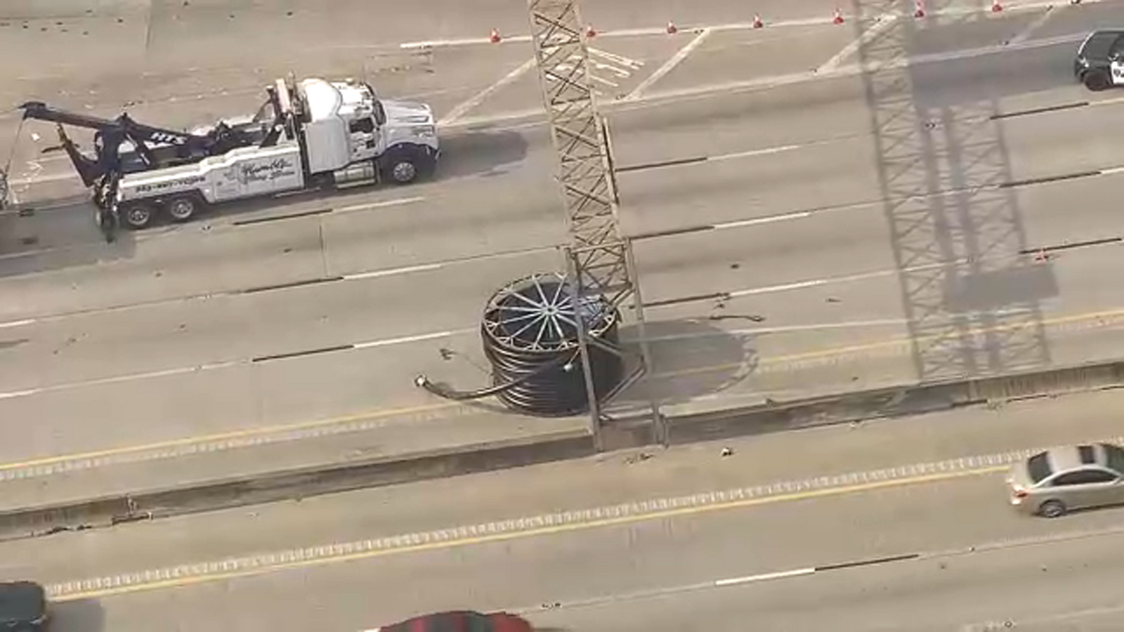 13 Alert Traffic: I-10 East Freeway westbound lanes reopened after spools roll off big rig ...