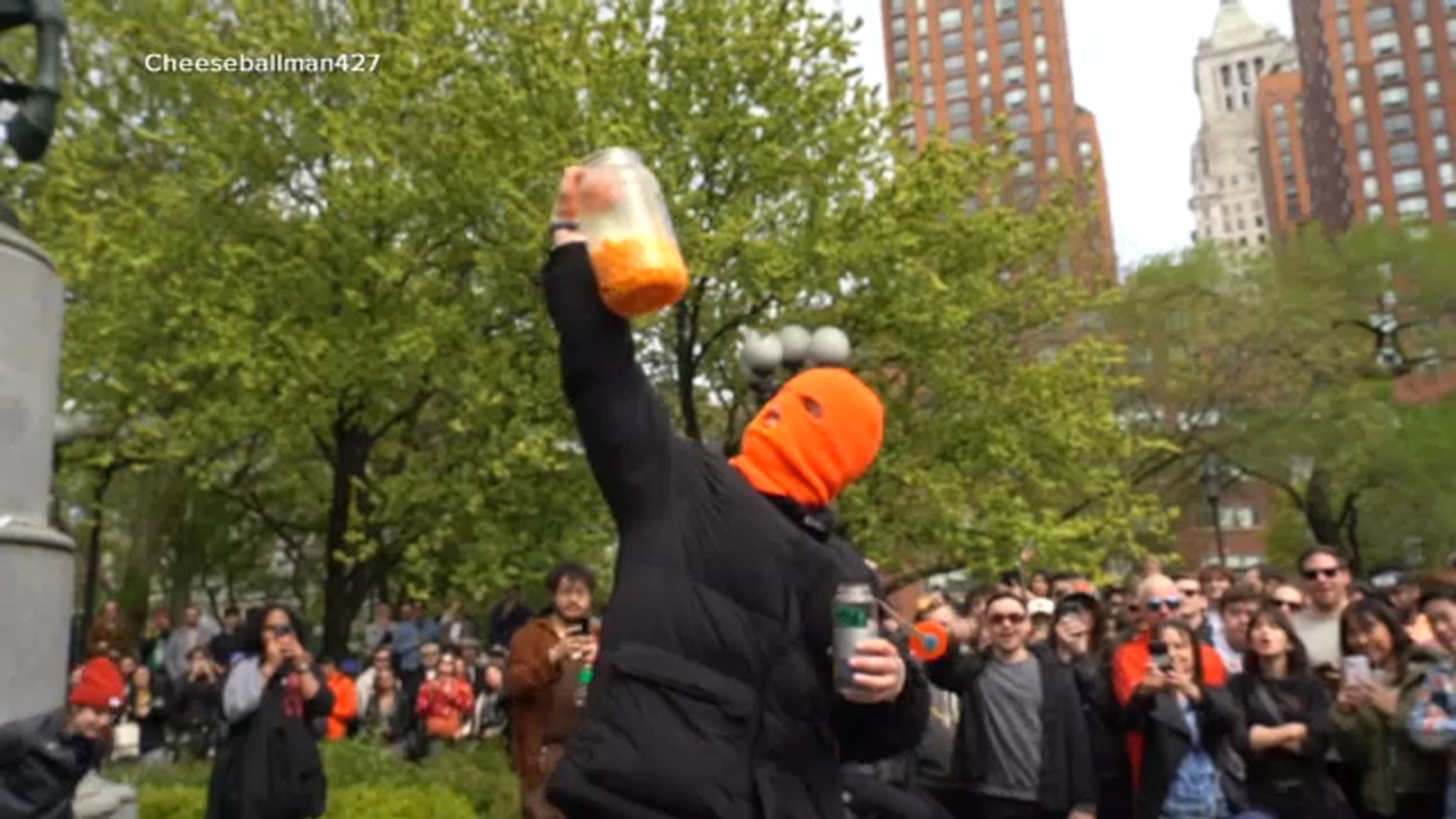 Cheeseball Man: Hundreds watched a masked man eat an entire tub of ...