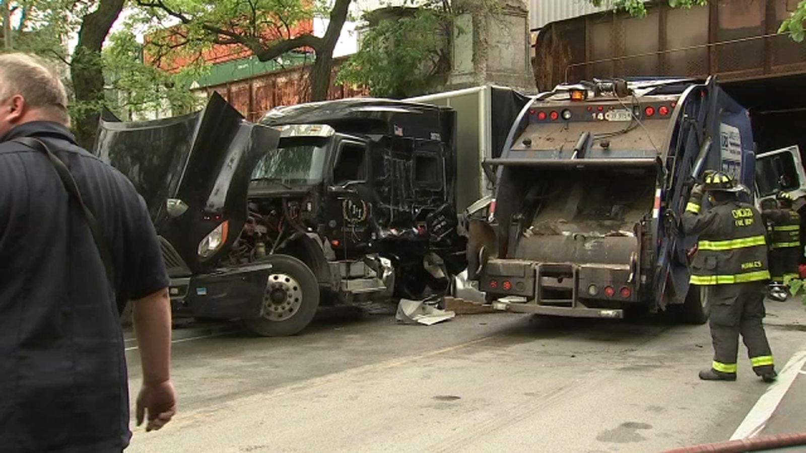 Chicago crash: Garbage truck driver trapped after hitting semi-truck on ...
