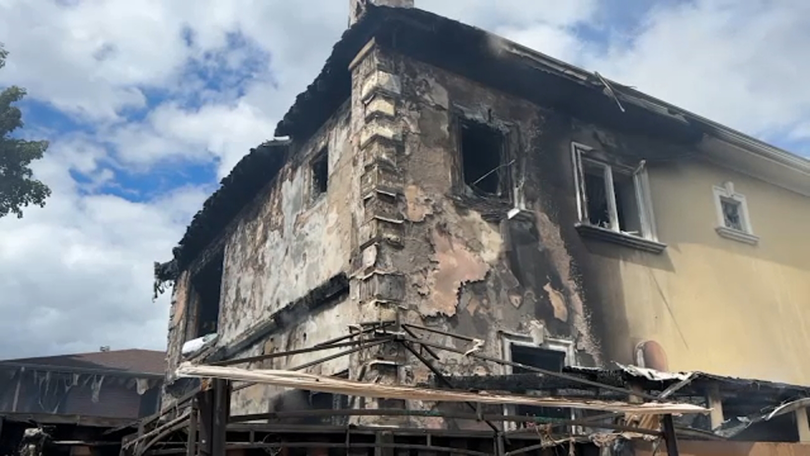 Queens fire: Blaze tears through home, surrounding property in ...