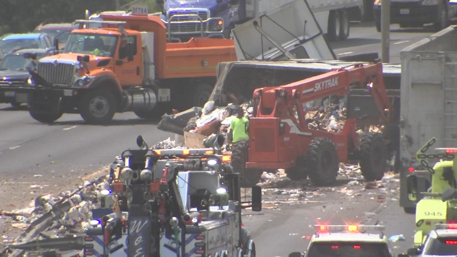 Garbage truck crash spills trash all over Bishop Ford Freeway near ...