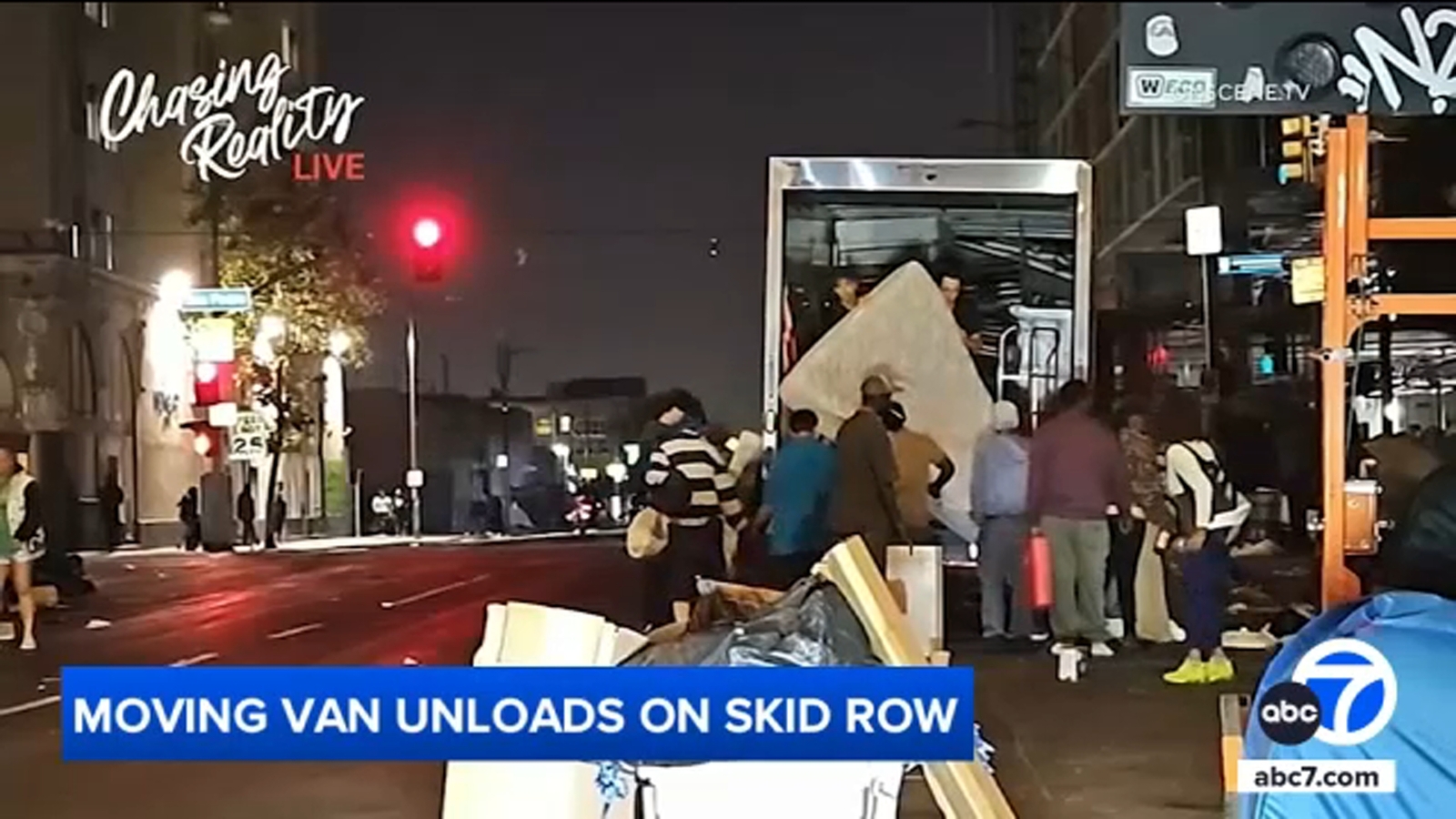 Movers seen on video unloading truck full of furniture onto Skid Row ...
