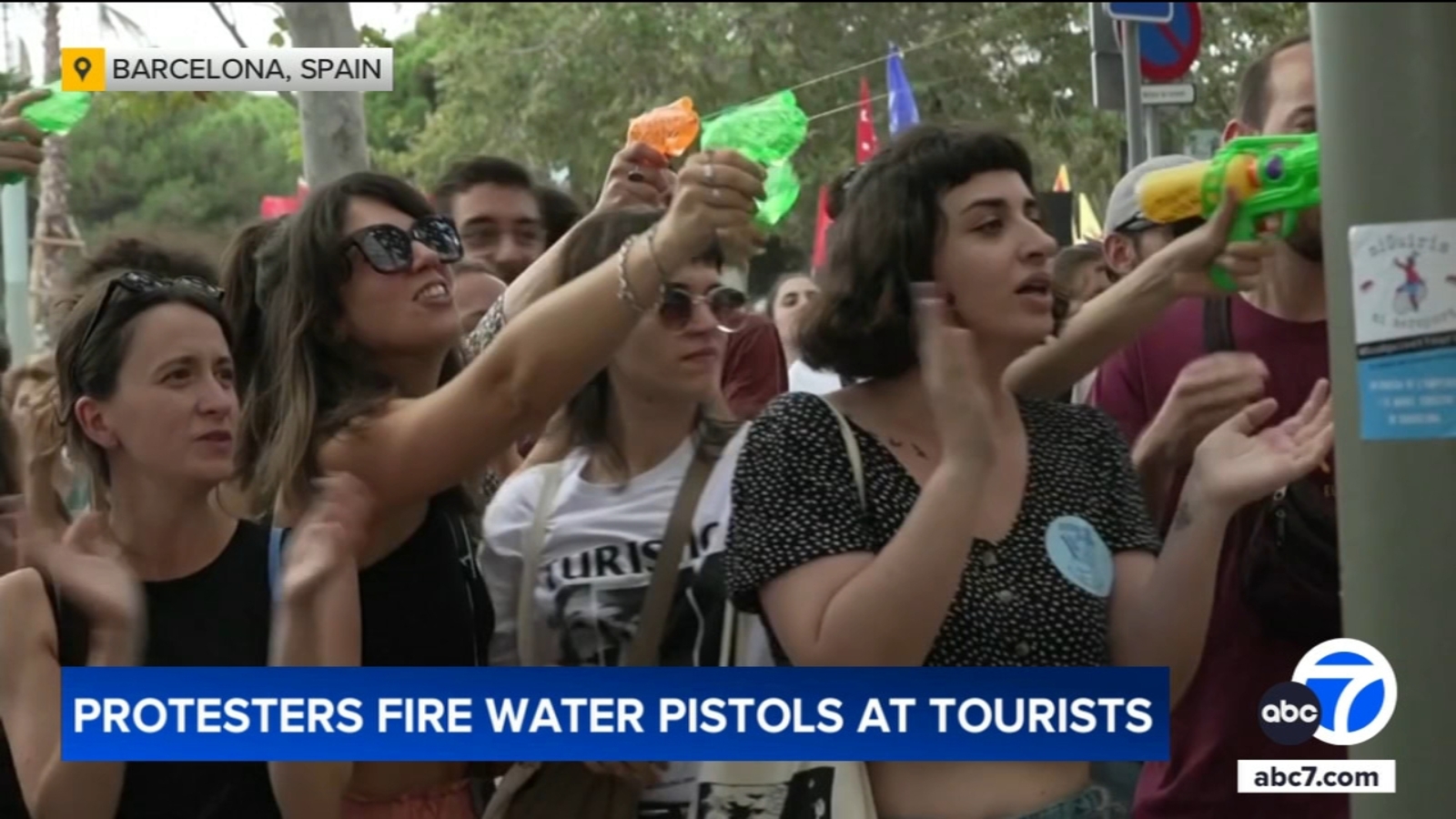 Barcelona anti-tourism protesters fire water pistols at visitors - ABC7 ...