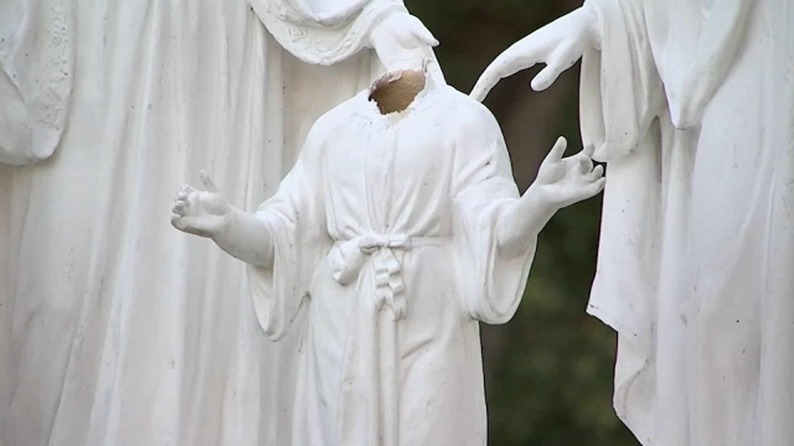 Man arrested for allegedly vandalizing statues outside Queens Catholic ...