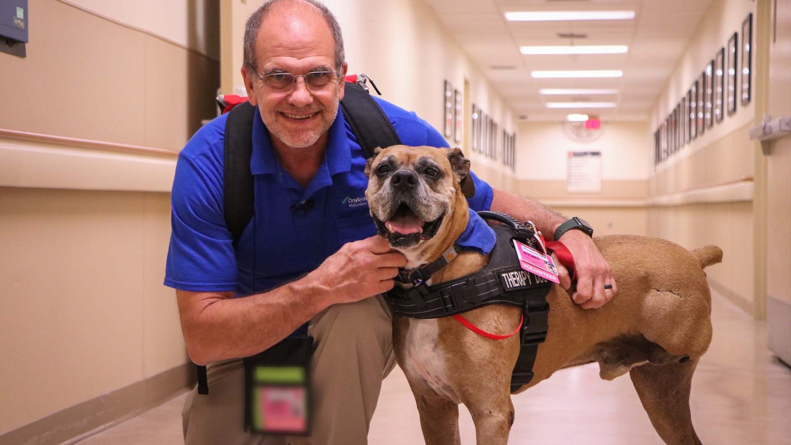 Teacher and his 3-legged therapy dog make a difference at area ...